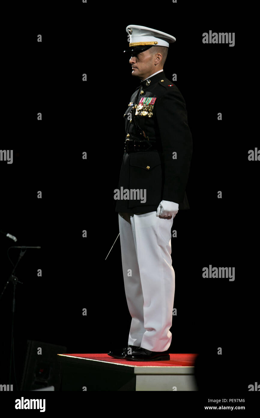 Chief Warrant Officer 3 Joshua A. Stone stands on his podium as he ...