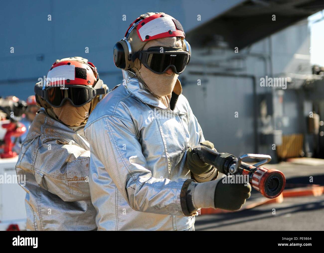 151111-N-UG095-020 PACIFIC OCEAN (Nov. 11, 2015) Sailors assigned to ...
