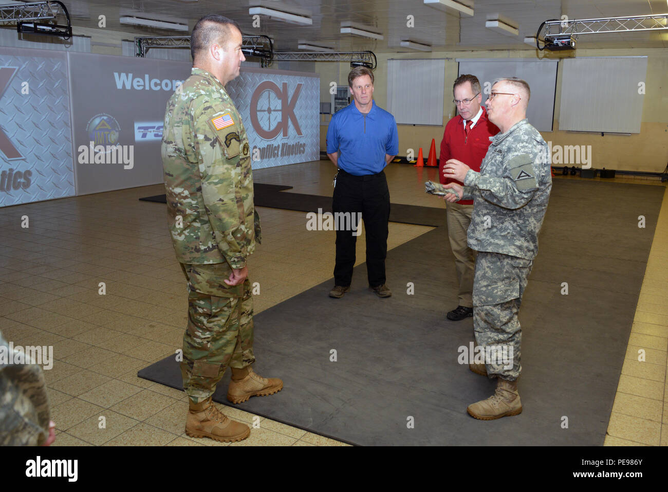 U.S. Army Master Sgt. Keith Norris (right), assigned to Training ...