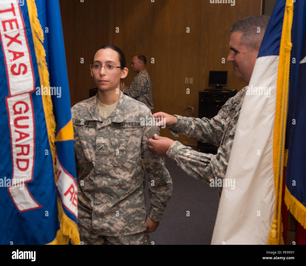 Col. Robert Woodmansee, right, commander of the 2nd Regiment, Texas ...