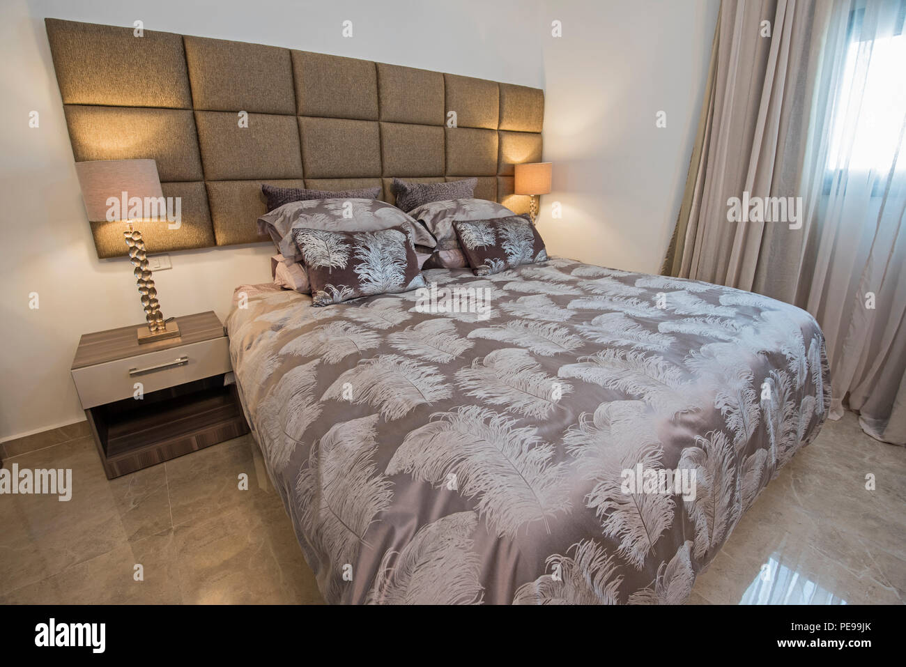 Interior design decor furnishing of luxury show home bedroom with ...