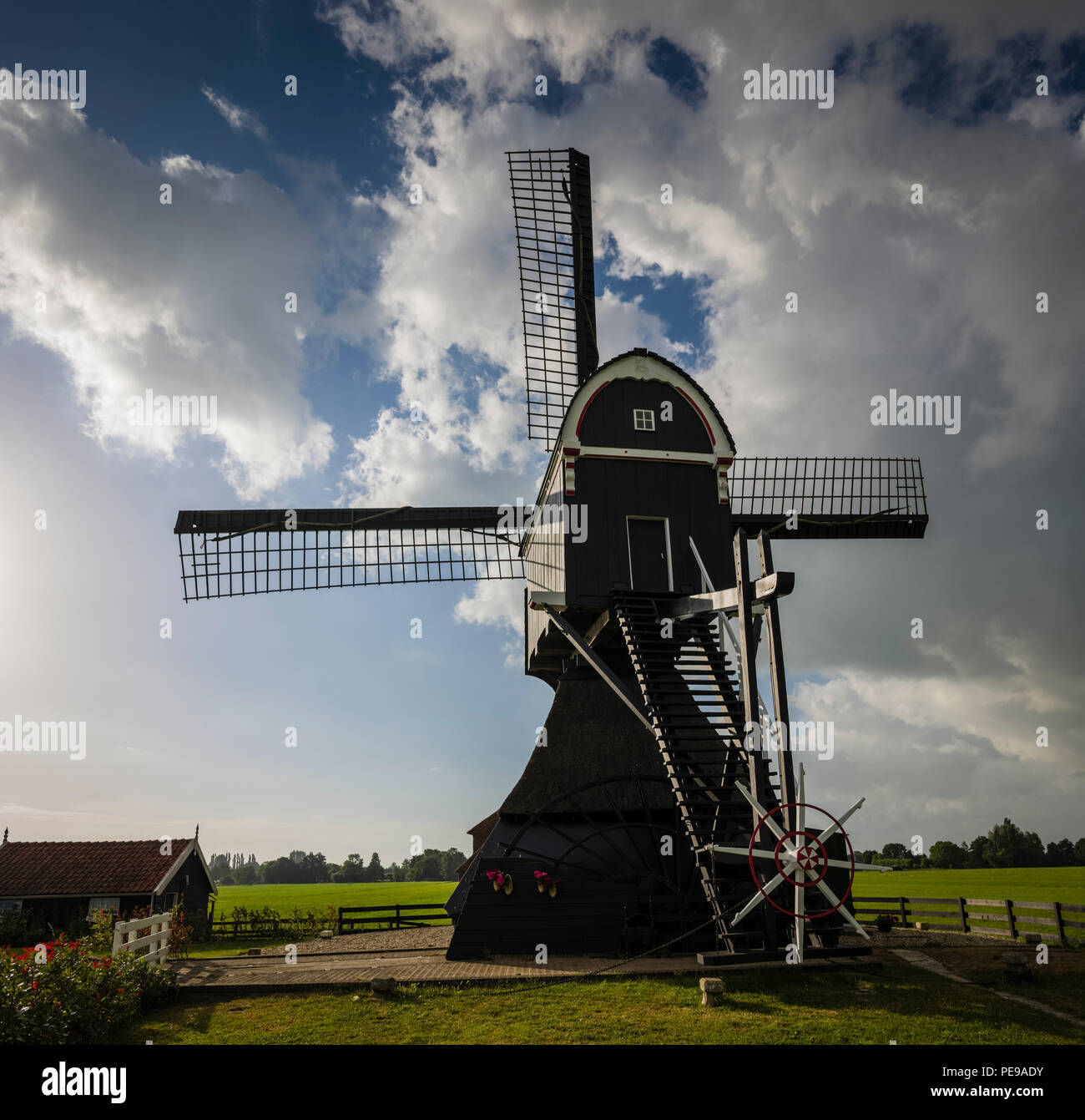 Traditional Dutch windmills in the Kinderdijk area, Holland Stock Photo ...