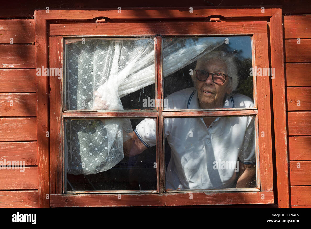 Partially sighted woman suffering from age-related macular degeneration ...