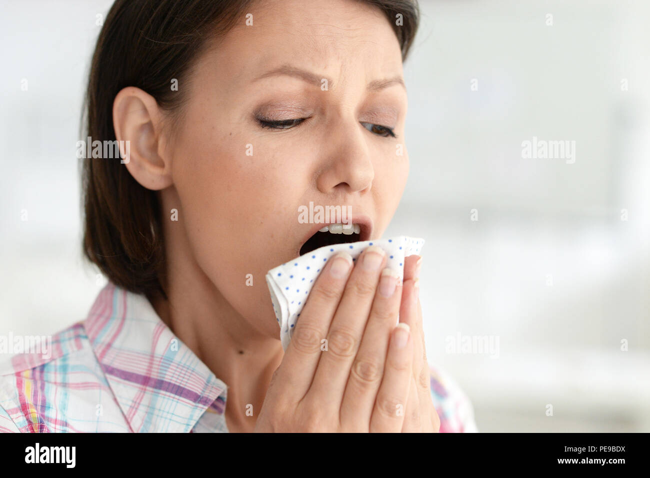 Close up portrait of sick young woman crying Stock Photo - Alamy