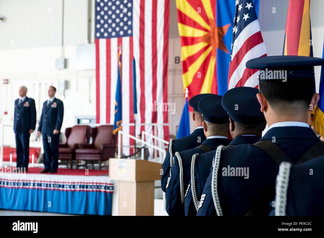 The 162nd Wing honor guard members stand ready to proceed with their ...