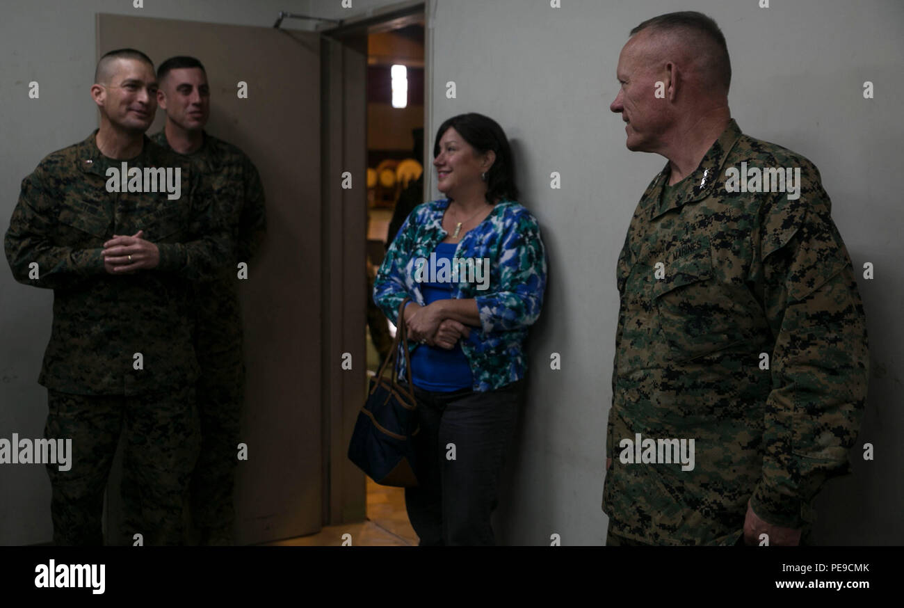 U.S. Marine Corps Chief Warrant Officer 3 Joshua A. Stone (left) speaks ...