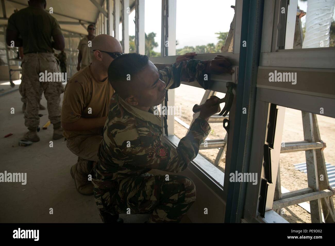 Falintil-Forcas de Defesa de Timor Leste Pvt. Pedro Lopes, right ...