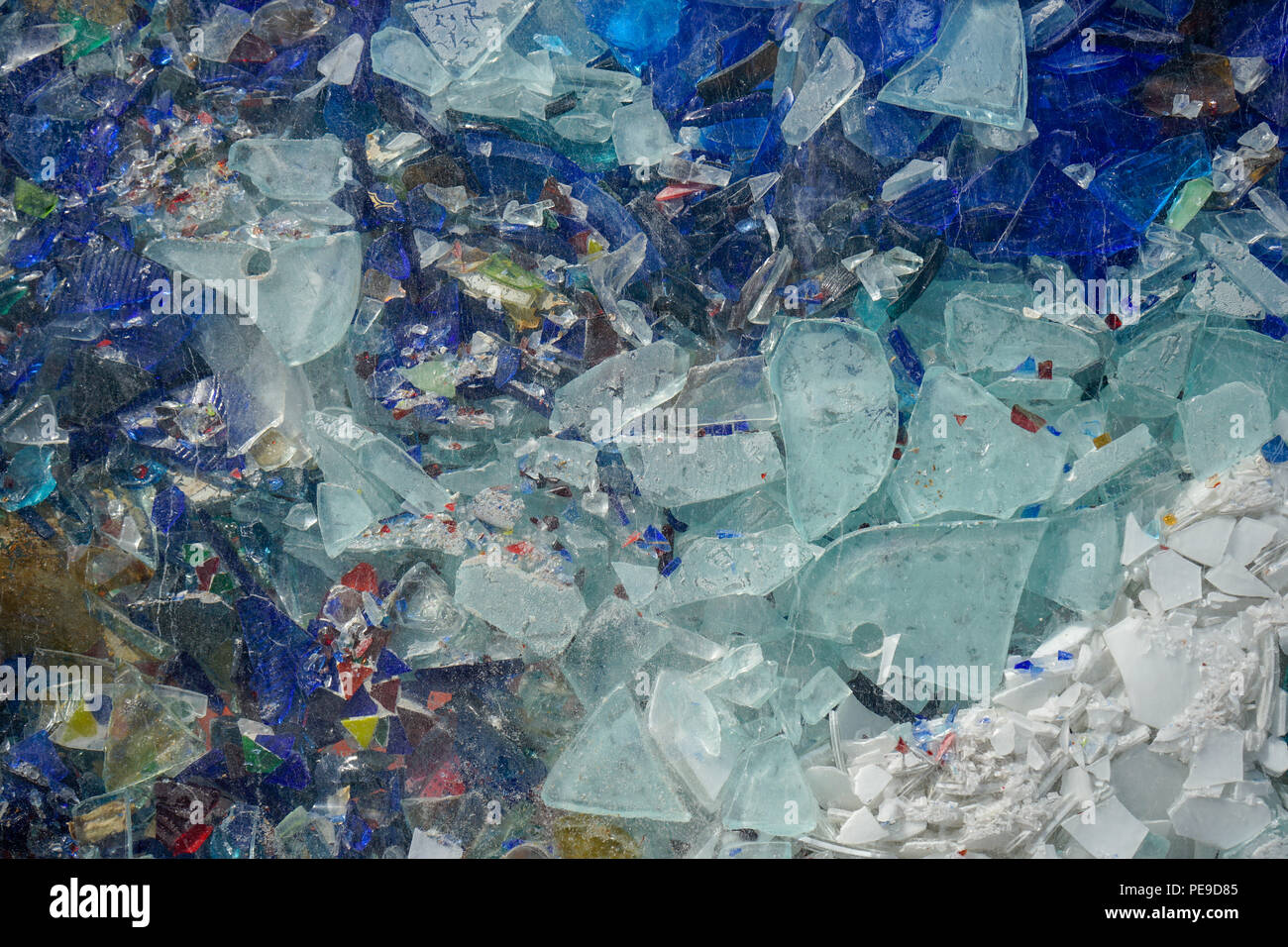abstracct pattern of broken glass mixed togheter with various colours ...