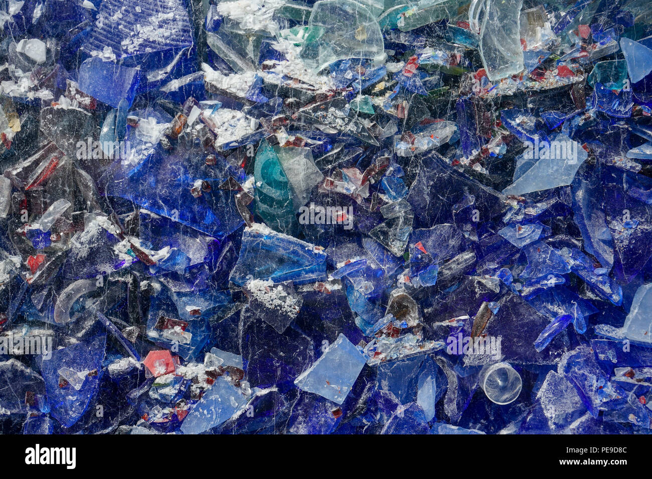 abstracct pattern of broken glass mixed togheter with various colours ...