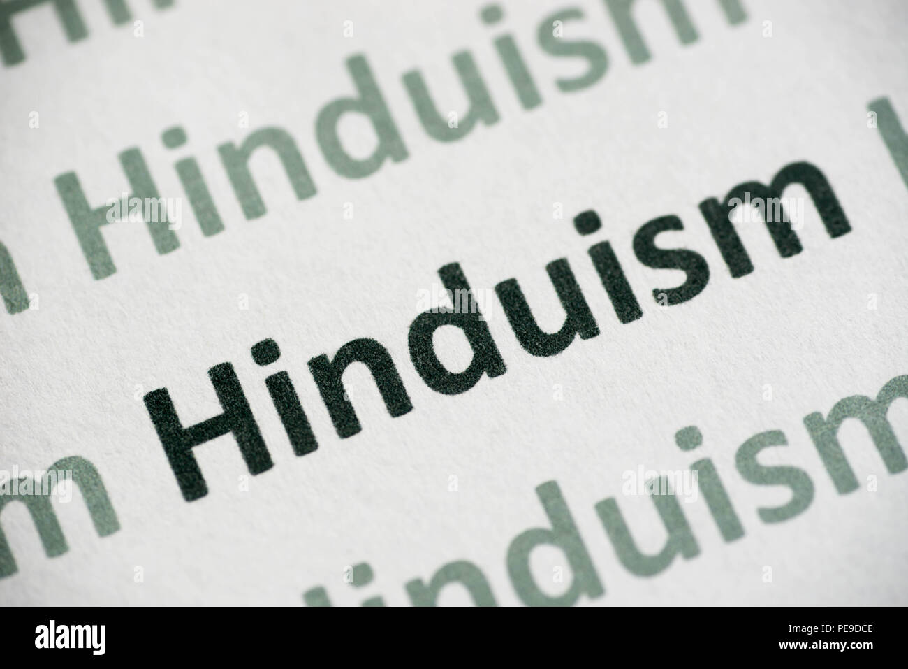 word Hinduism printed on white paper macro Stock Photo - Alamy