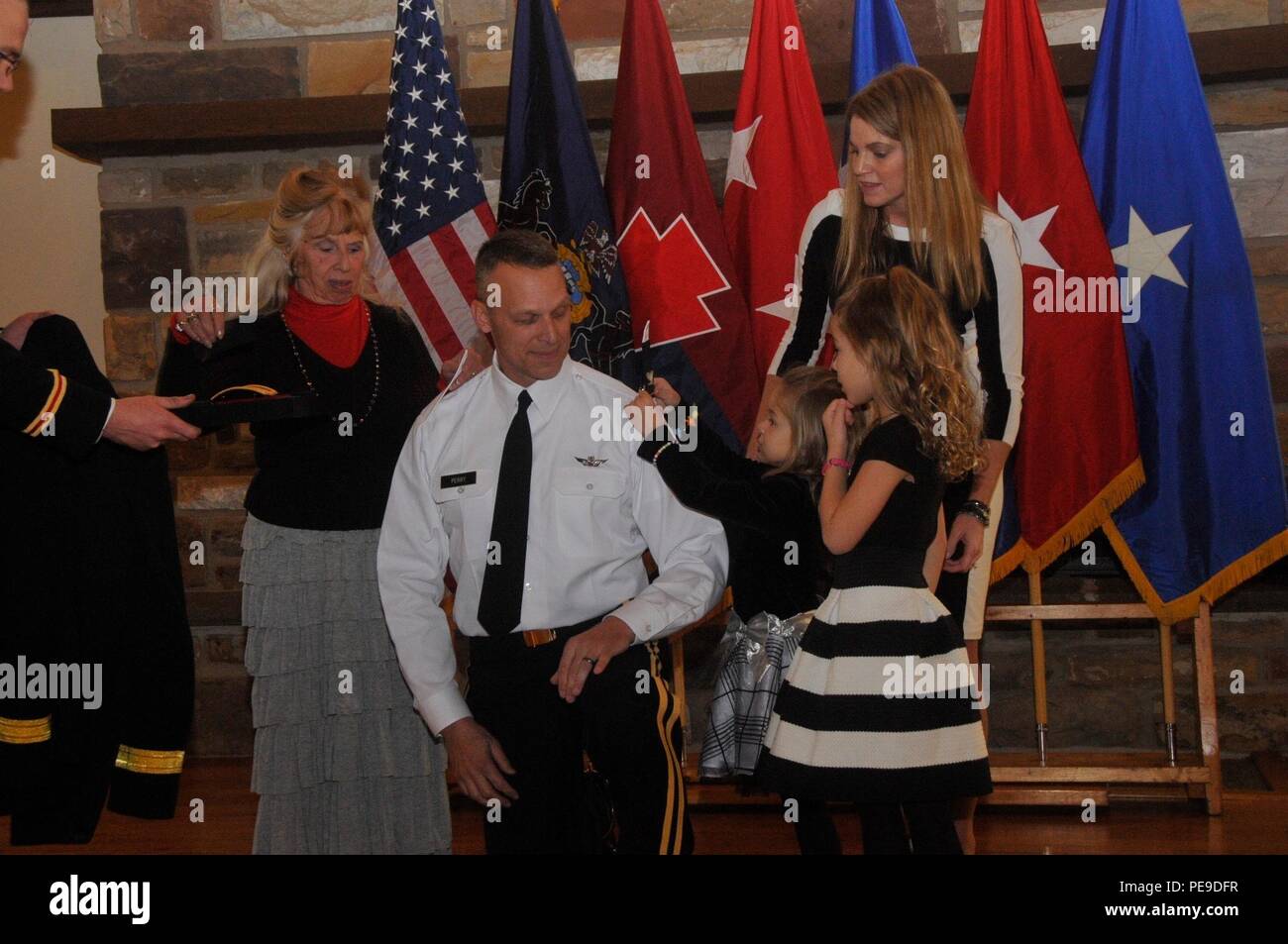 In front of a large gathering of family and fellow soldiers, Scott ...