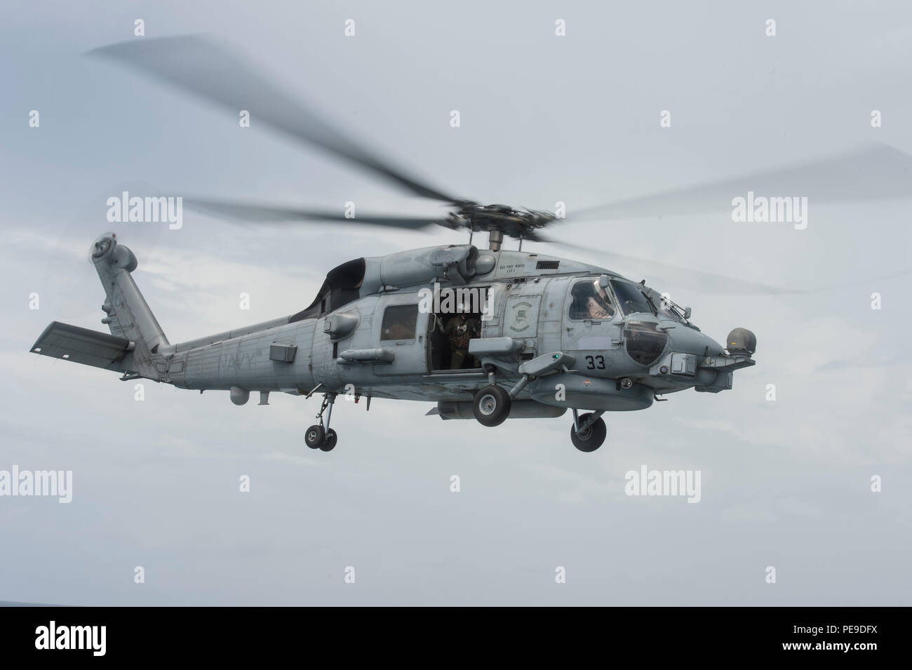 A MH-60R Seahawk helicopter from Helicopter Maritime Strike Squadron ...
