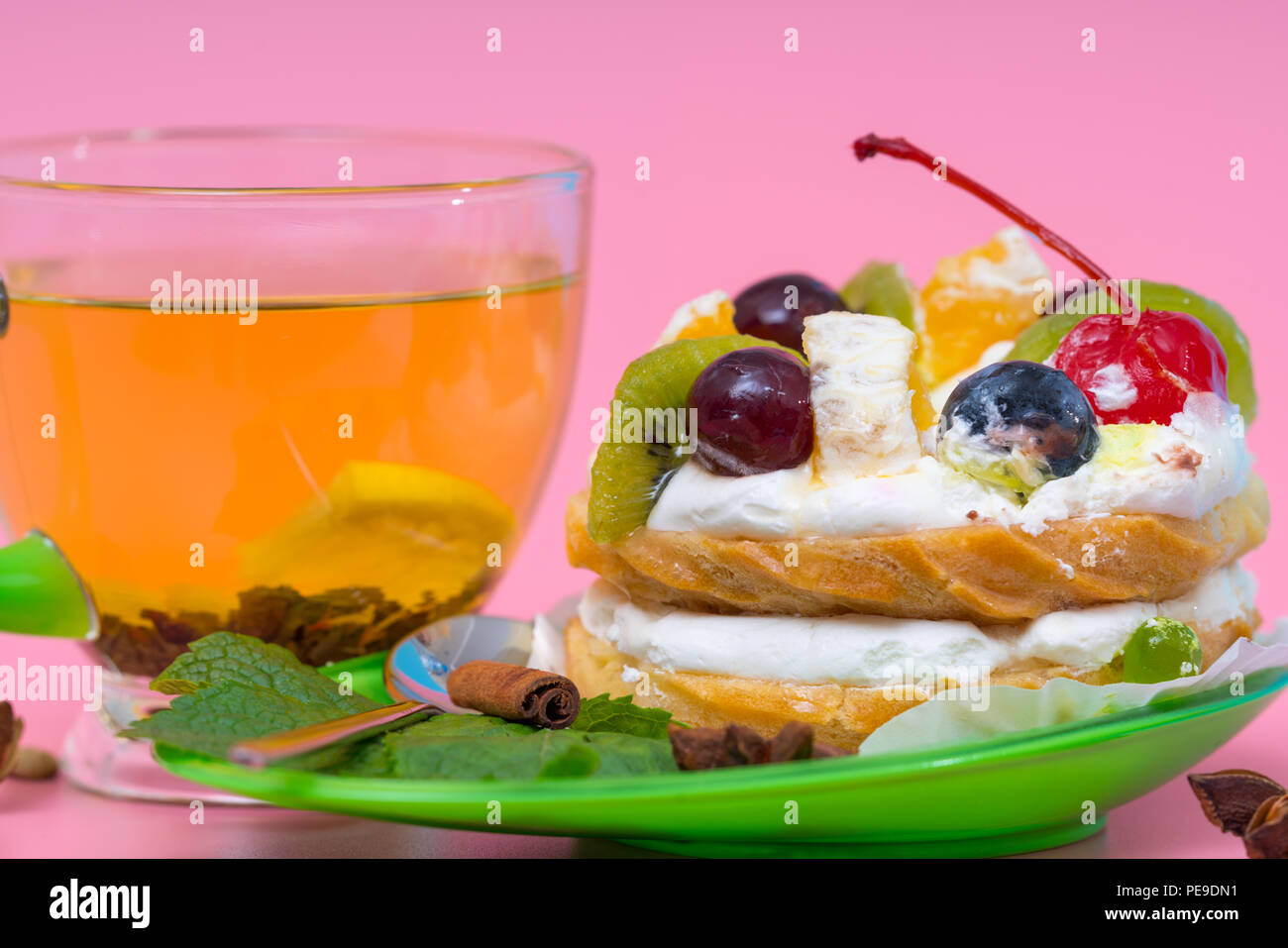 Double decker creamy mixed fruit pastry Stock Photo - Alamy