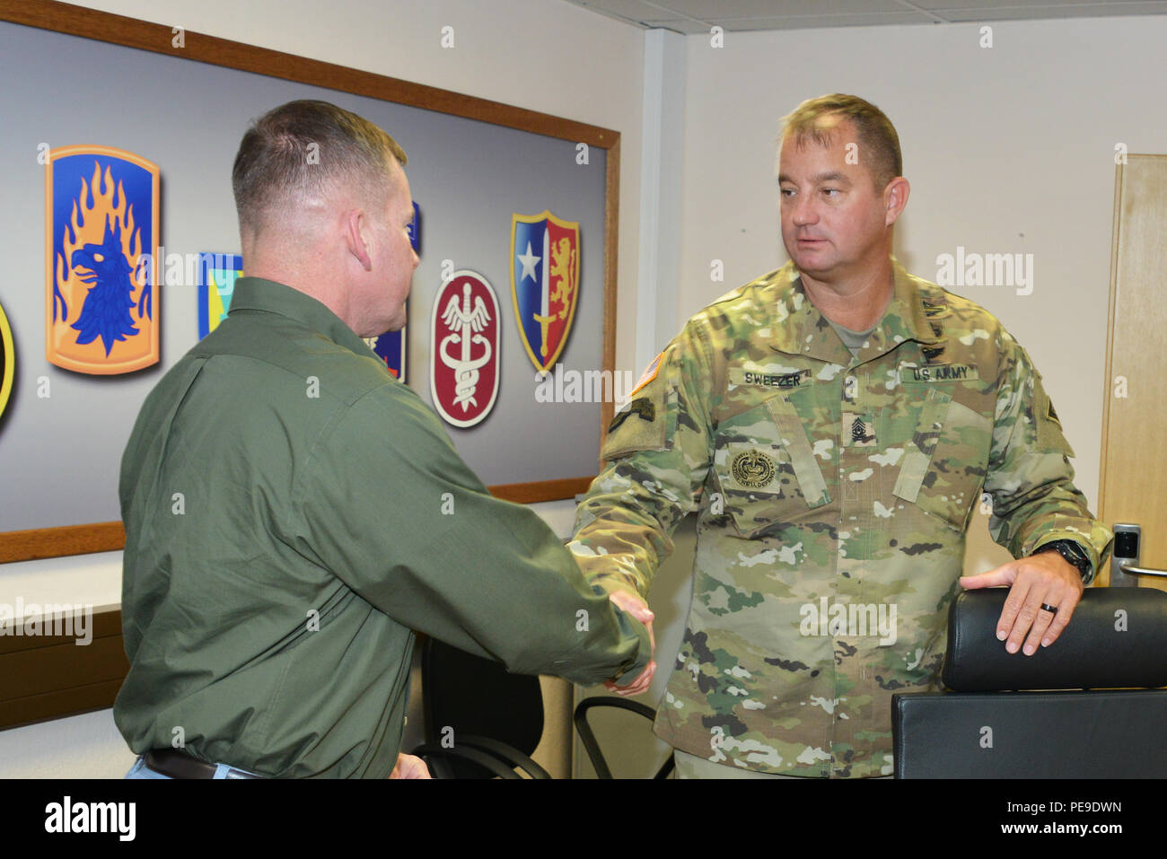 Michael W. Minor (left), the director of Training Support Activity ...
