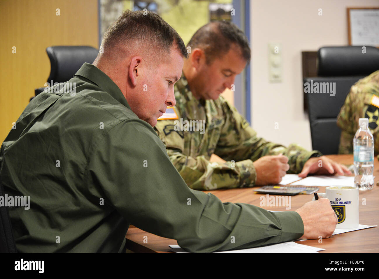 Michael W. Minor (left), the director of Training Support Activity ...
