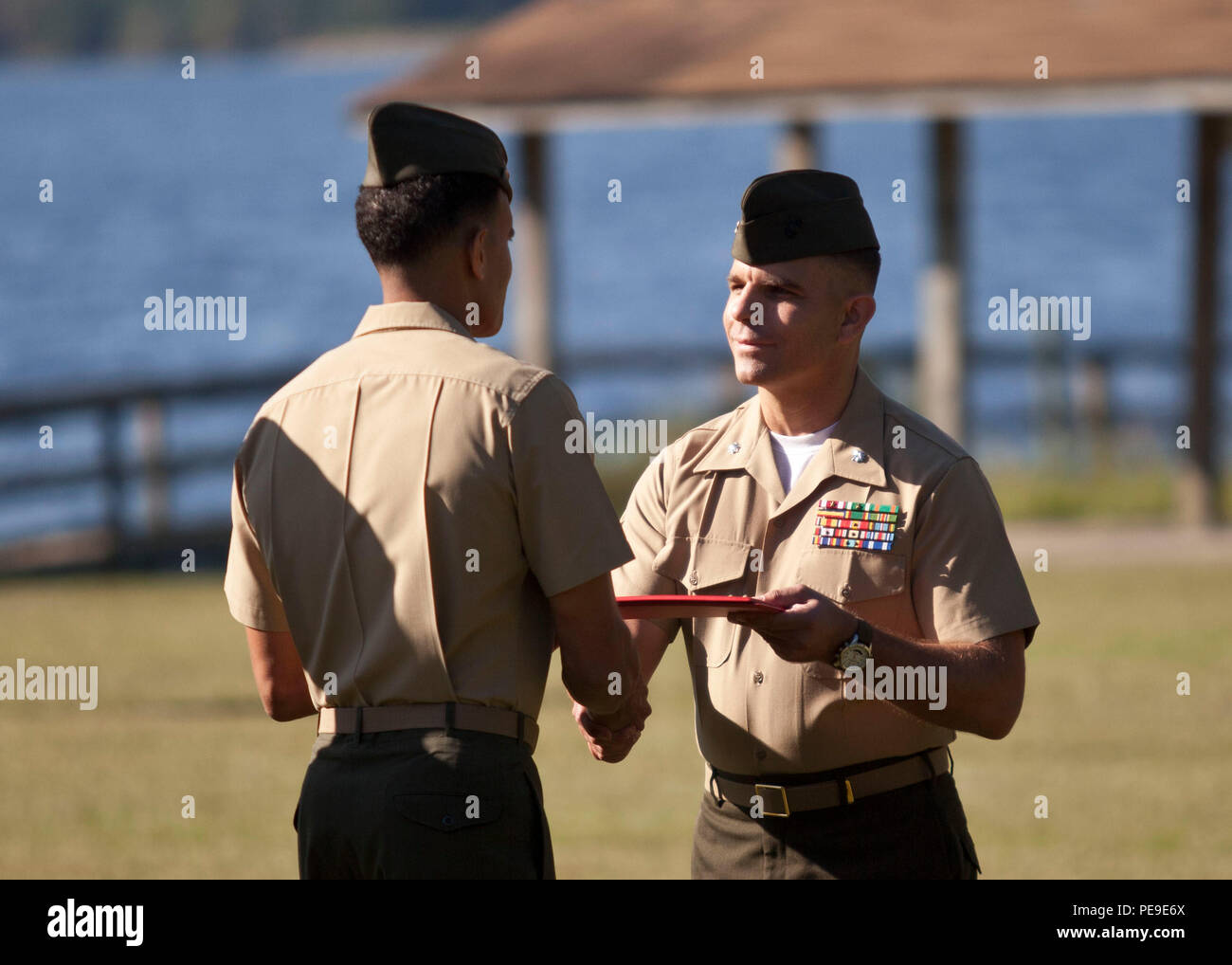 U.S. Marine Corps Col. David E. Jones, left, commanding officer of ...