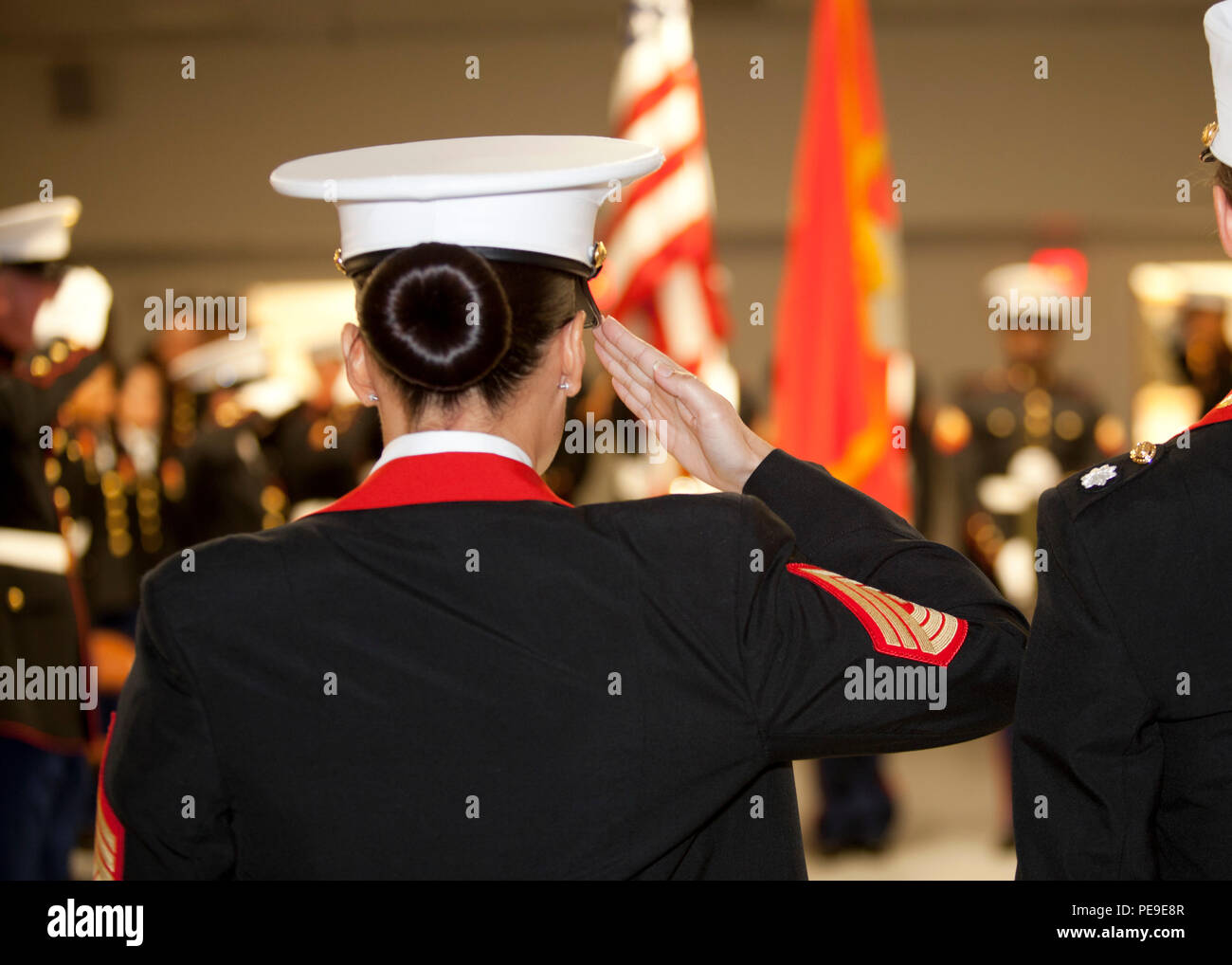 U.S. Marine Corps First Sgt. (retired) Deborah Trower renders a salute ...