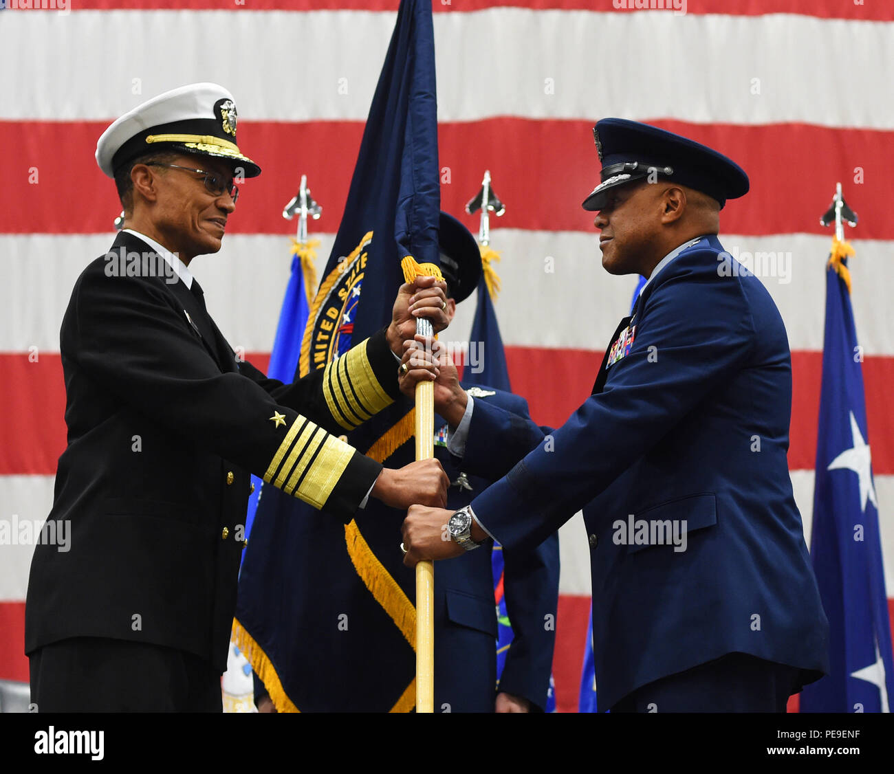 Adm. Cecil D. Haney, U.S. Strategic Command commander, presents the ...
