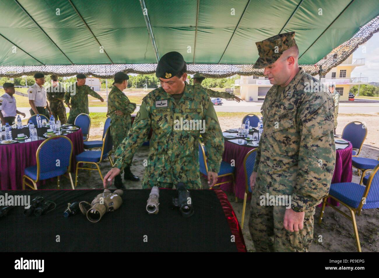TUTONG, Brunei (Nov. 11, 2015) U.S. Marine Capt. Kyle Kurtz, right ...