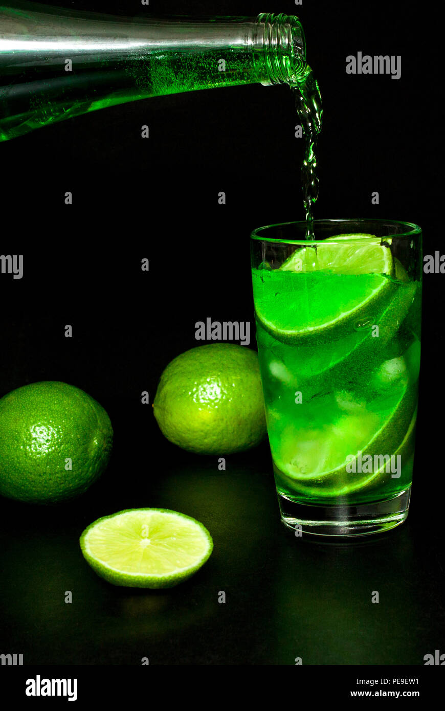 Lemonade poured glass ice lime hi-res stock photography and images - Alamy
