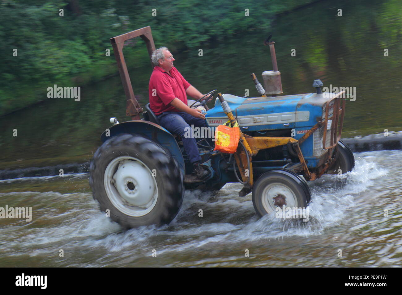 Ford Tractor Crossing A Ford High Resolution Stock Photography and ...