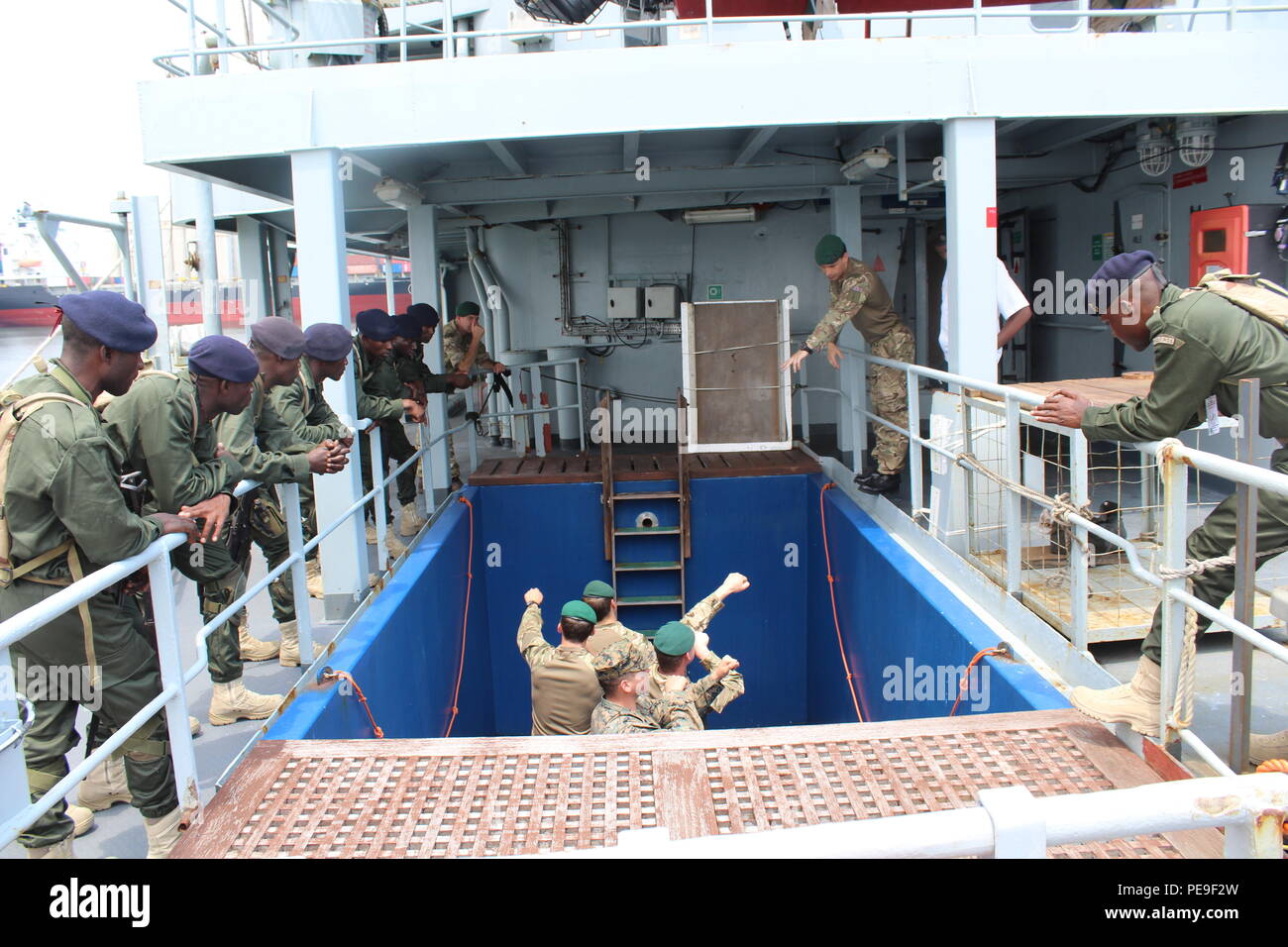 U.S. Marines assist United Kingdom Royal Marine Commandos in teaching ...