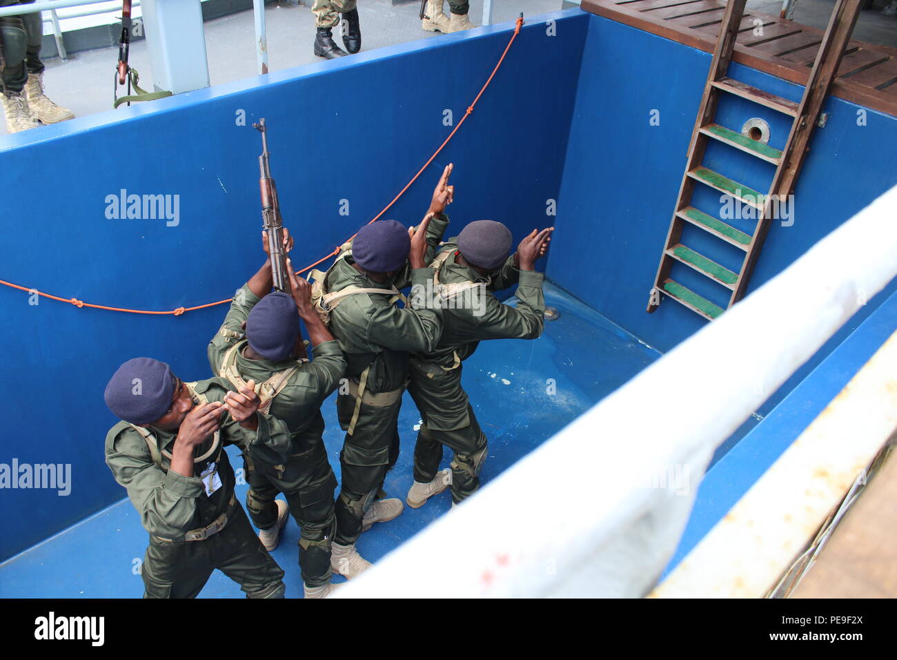 U.S. Marines assist United Kingdom Royal Marine Commandos in teaching ...
