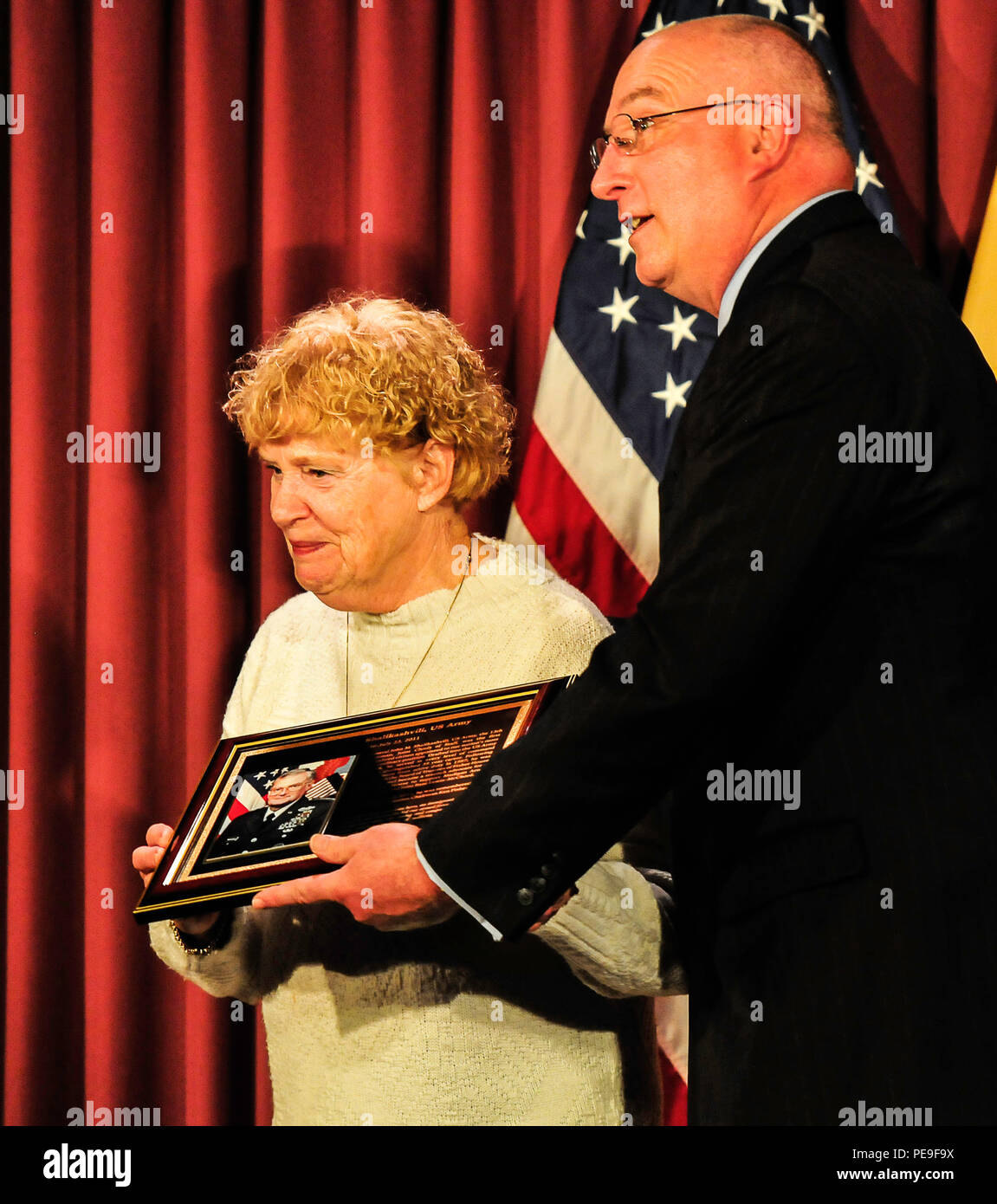 David Coker, president of the Fisher House Foundation, presents a ...