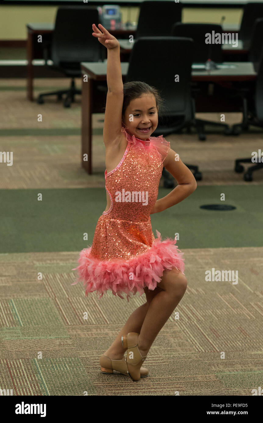 Chloe Grace Locklear, 8, Little Miss Lumbee, performs a tap dance ...