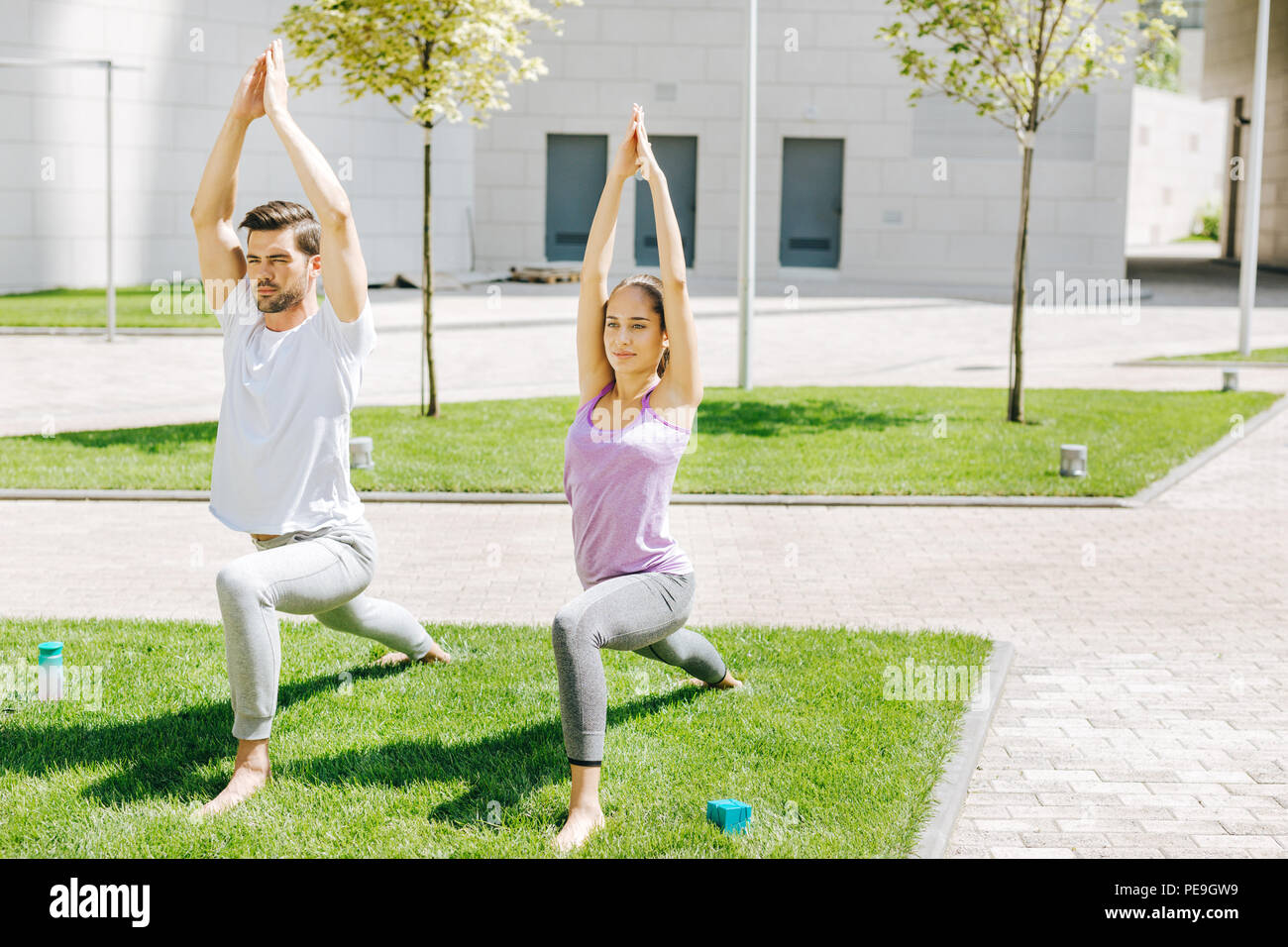Joyful positive people having a workout Stock Photo - Alamy