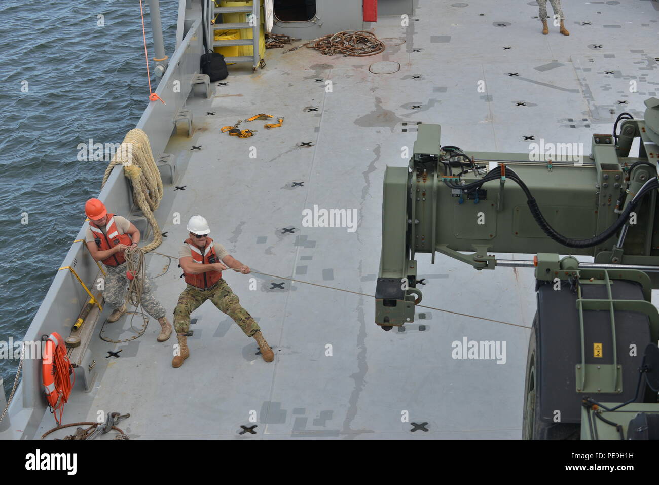 Crew members of the U.S. Army Vessel Brandy Station assigned to 97th ...
