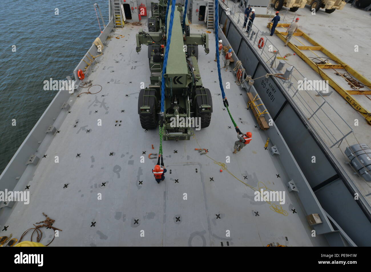Crew members of the U.S. Army Vessel Brandy Station assigned to 97th ...