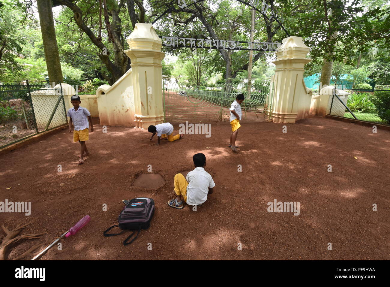 The Patha Bhavana students are playing in front of the gateway of the ...