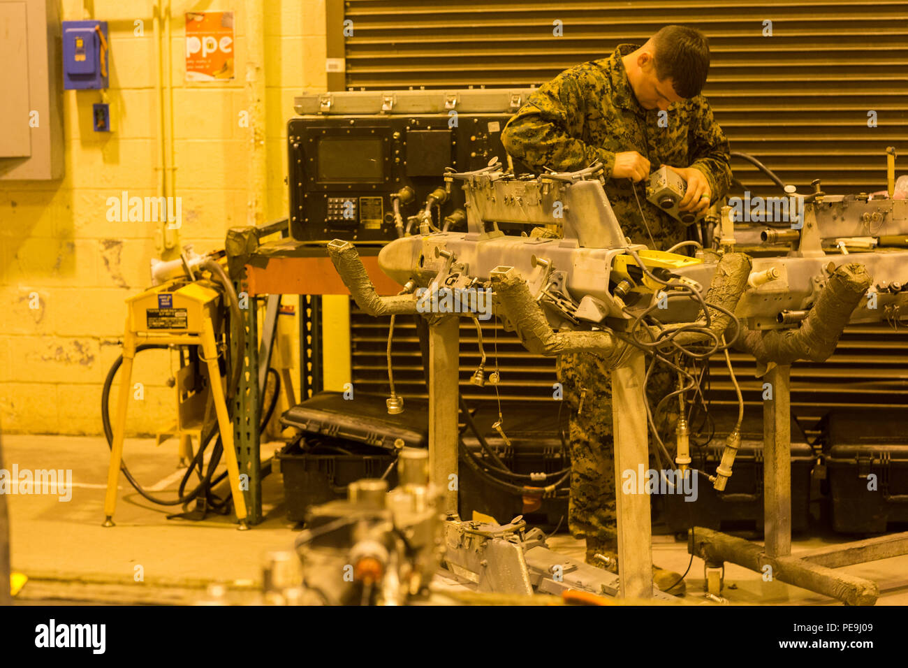 U.S. Marine Corps Staff Sgt. Taylor D. Ashburn, an aviation ordnance ...