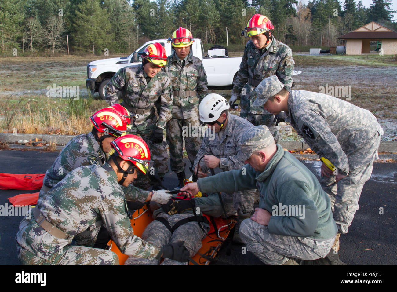 Service members from the U.S. Army and U.S. Air Force demonstrate ways ...