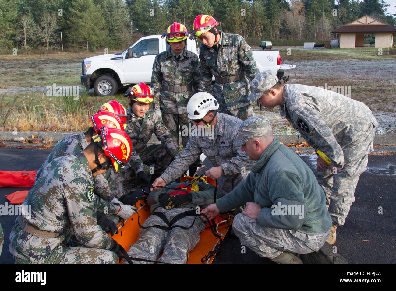 Service members from the U. S. Army and U.S. Air Force demonstrate ways ...