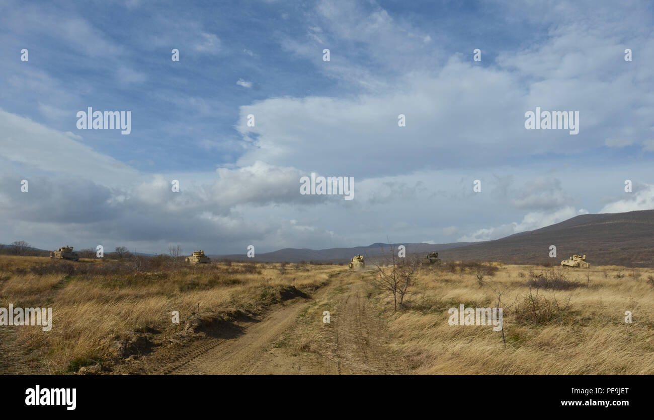 U.S. soldiers are on the offensive move against the enemy with Bradley ...