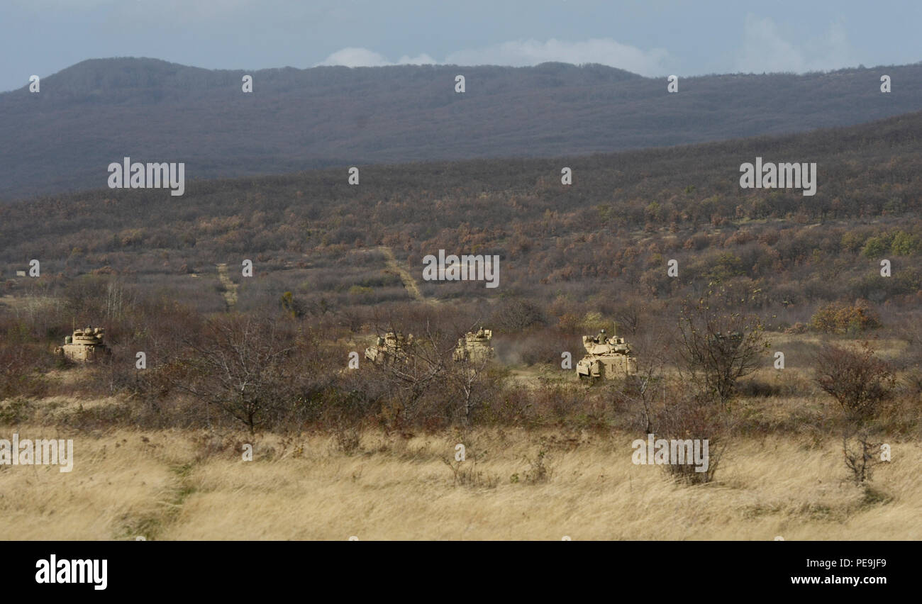 U.S. soldiers are on the offensive move against the enemy with Bradley ...