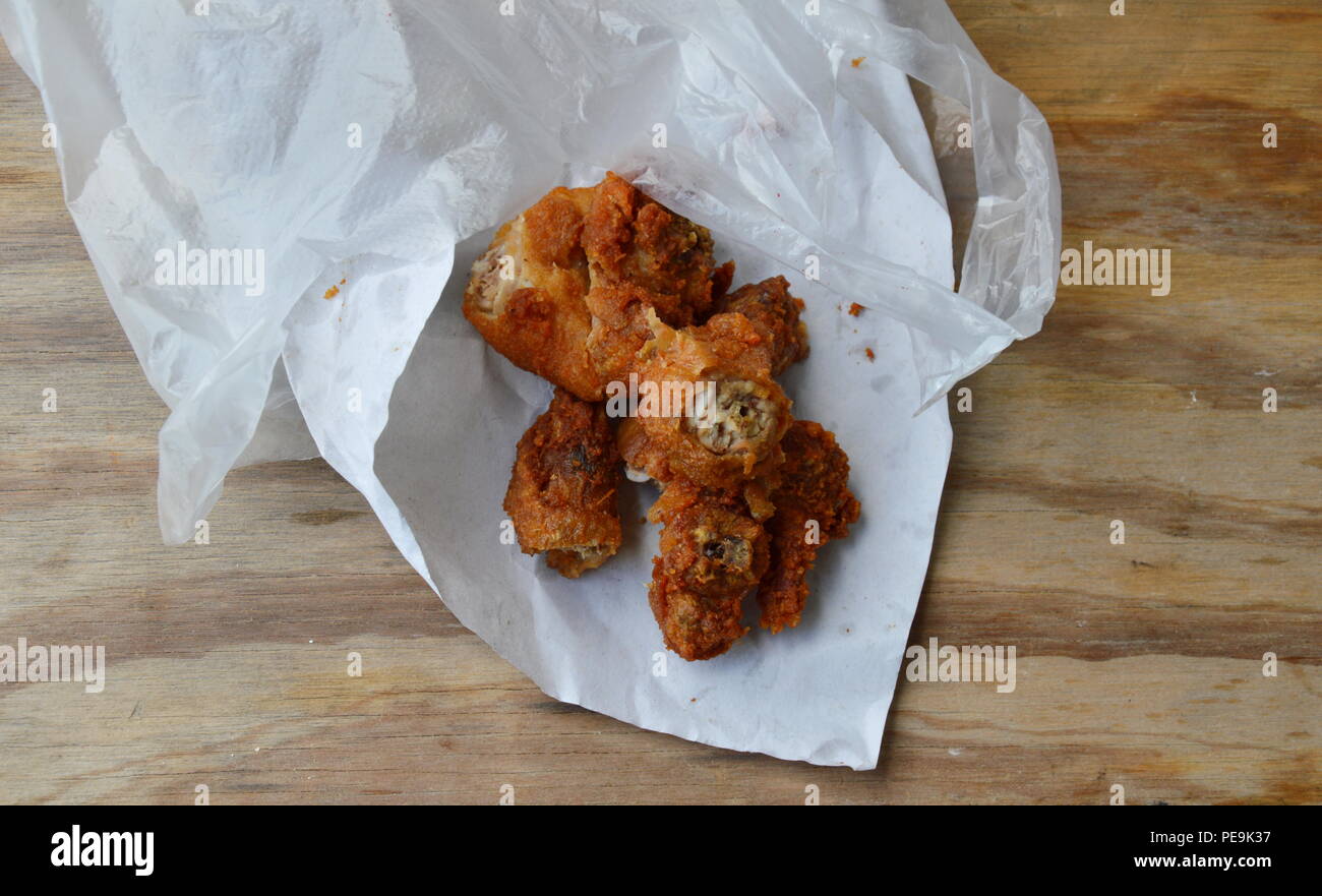 fried chicken in plastic bag for take home Stock Photo - Alamy