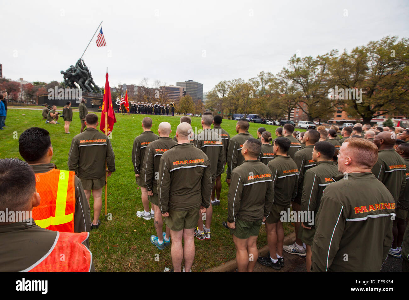 U.S. Marines with Headquarters Marine Corps (HQMC) sing the Marines ...