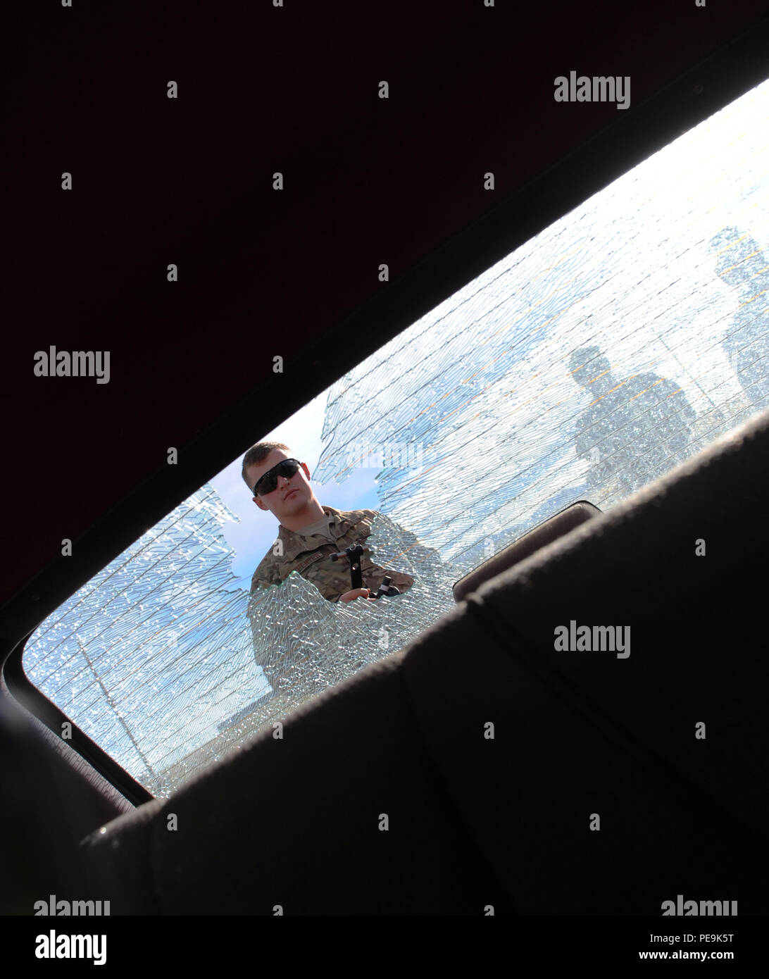 An Explosive Ordnance Technician from the 775th EOD Flight inspects the ...