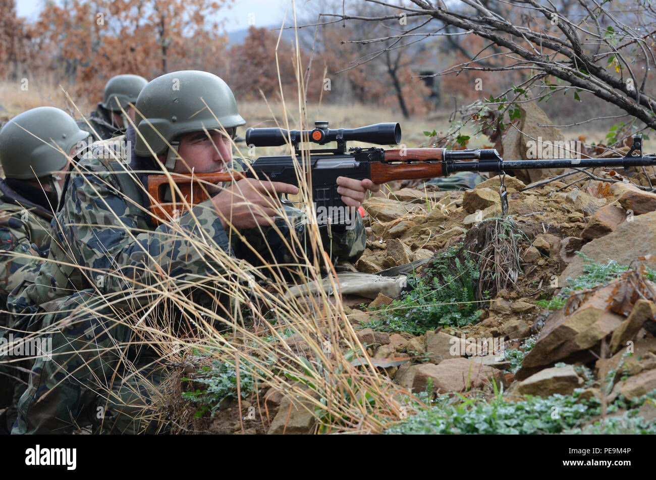 A Bulgarian soldier of 1-61st Mechanized Battalion looks through the ...