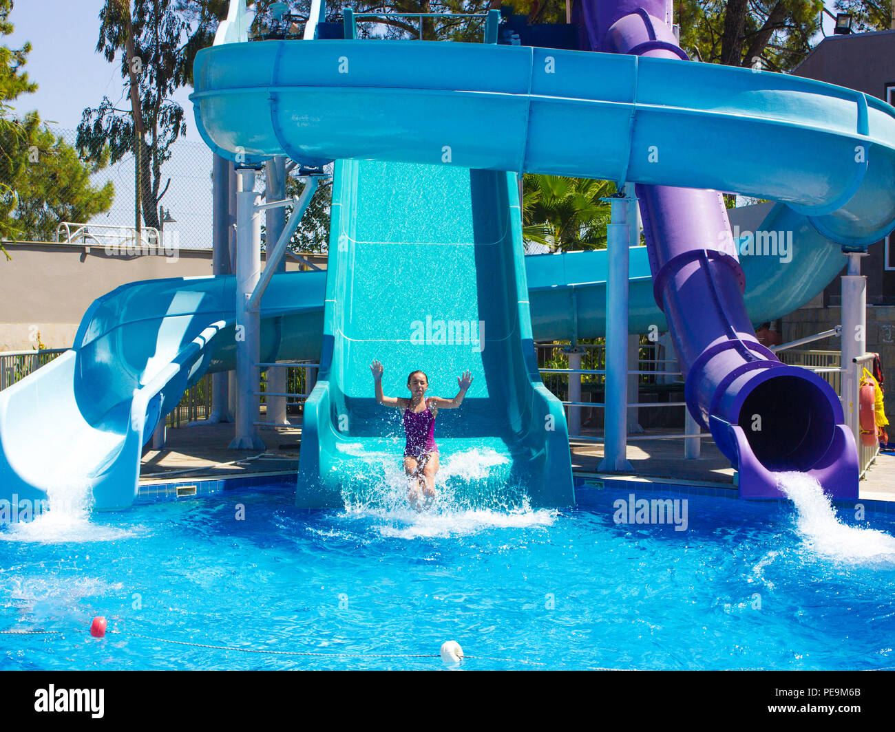 Teen water slide hi-res stock photography and images - Alamy