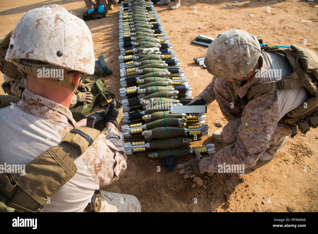 U.S. Marine Master Sgt. Ryan Glau, left, and Sgt. John Veenhuizen ...