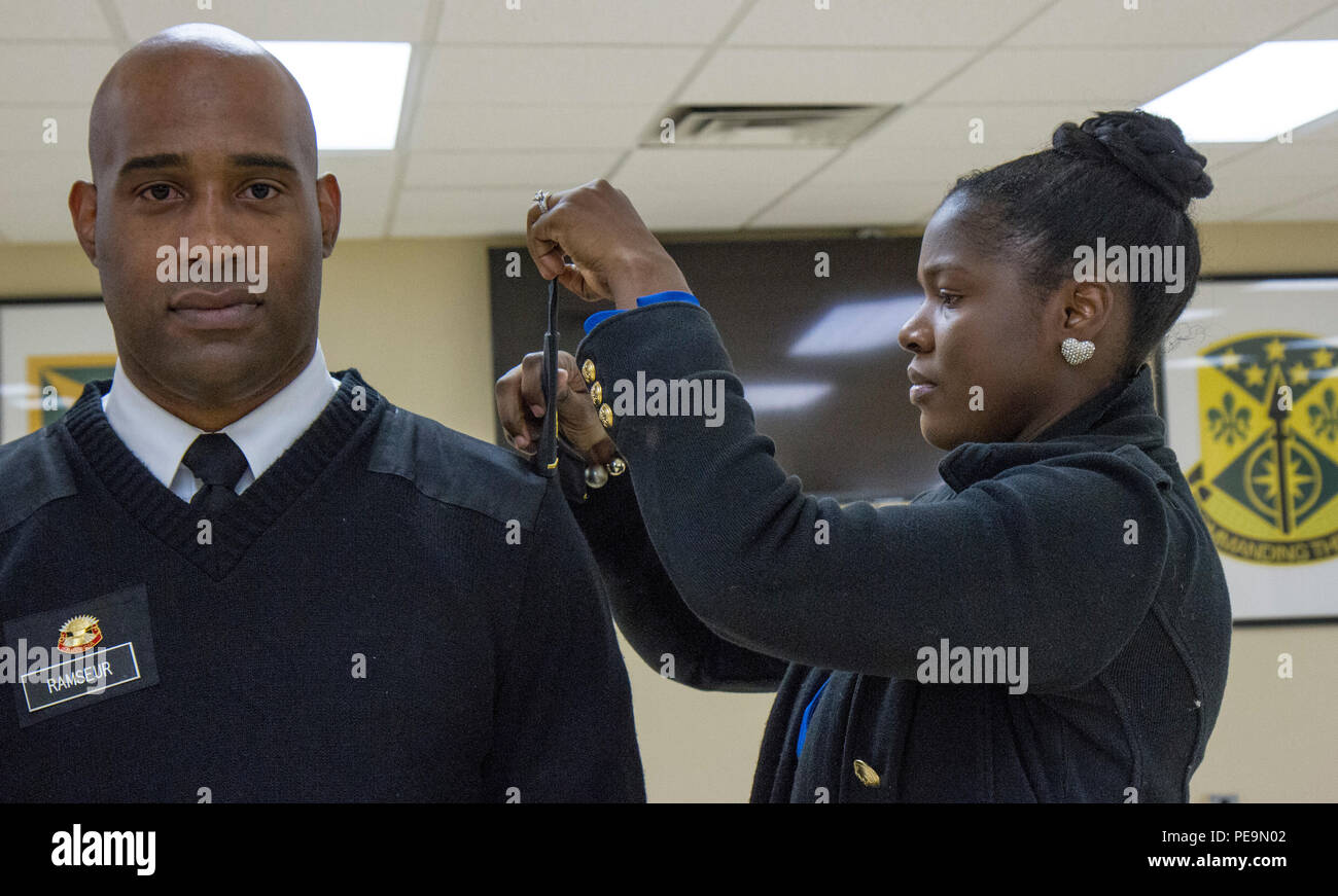 Janine Ramseur, wife of Maj. Micah Ramseur, a logistics officer with ...