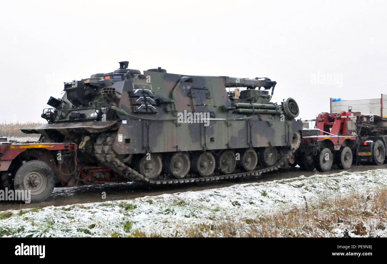 An M88 Hercules tank is off loaded from a trailer on Nov. 24, 2015 in ...