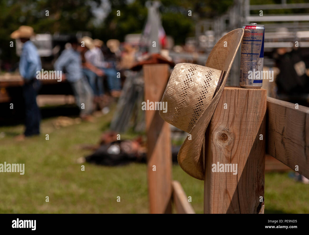 Cowboy hats and gloves rest ontop of fence posts at the 2018 Ram Rodeo ...
