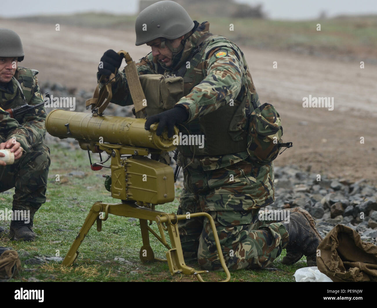 A Bulgarian soldier of 1-61st Mechanized Battalion sets up a 9M111M ...