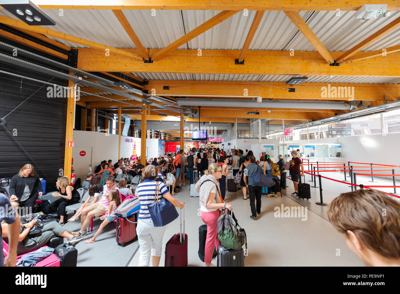 Passengers inside the Billi terminal, Bordeaux airport, Bordeaux France ...