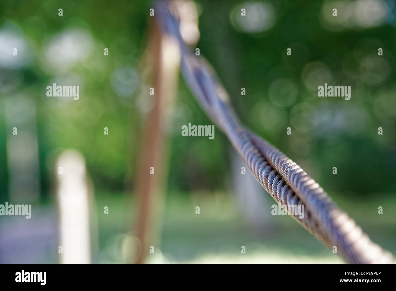 Thick steel rope close up. Bridge fence element. Detailed view. The ...